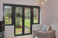 China Commercial Aluminum Stacker Door Exterior Double Tempered Glass 2.0mm Profile Thickness for sale
