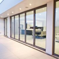 China Double Glazed Black Aluminum Sliding Door With Flyscreen for sale