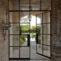 China Narrow Frame Noiseless Aluminum Casement Door 1.2mm-2.0mm Double Tempered Glass for sale
