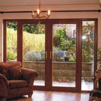 China Wood Grain Aluminium Double Hinged Doors for sale