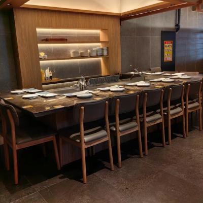 China Commercial Teppanyaki Grill Table with 7-10 Seats 500*400mm Cooking Area and 50-300℃ Temperature Range for sale