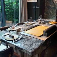 China Round Copper Teppanyaki Table with Electric Heating for sale