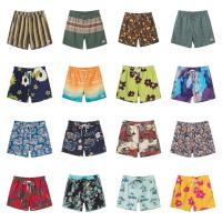 China Custom Design Your Own Logo Sublimation Printed Waterproof Board Shorts Four Way Stretch Swim Trunks for sale