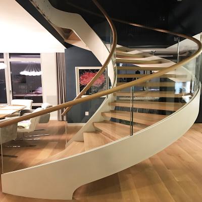 China Indoor Modern Curved Staircase Arc Shape Carbon Steel Stringer Easy Installation for sale
