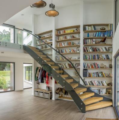 China Custom Curved Stairs with Interior Tempered Glass Railing and Wood Tread for sale