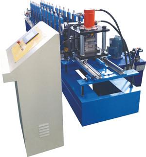 China Manual Decoiler Shutter Door Roll Forming Machine , 13 Stations Roller Shutter Door Machine for sale