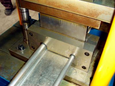 China 15 Kw Gear Box Driving Roll Door Frame Roll Forming Machine For Facade / Garage for sale