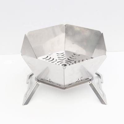 China Portable BBQ Charcoal Campfire Stove with Upper Folding Design 570mm*570mm*300cm for sale