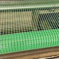 China Pavement Reinforced Plastic Geogrid Mesh Bitumen Coated Fiberglass Geogrid for sale
