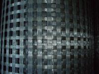 China Bitumen Coated Fiberglass Geogrid 25KN Fibreglass Rendering Mesh Roll for sale