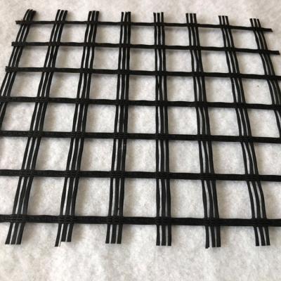 China Biaxial Warp Fiberglass Geogrid Roll Length 50m-100m Mesh Size 25mm X 25mm For Soil Separation And Reinforcement for sale