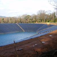 China Oxygen Index≥30 Percent HDPE Geomembrane Black White Blue Green Grey Red Yellow Durable Flexible Waterproof Liner Material for sale