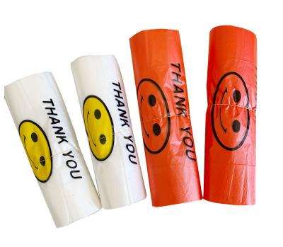China Custom T-Shirt Plastic Shopping Bags on Roll HDPE LDPE LLDPE 5-100 Mic Thickness for sale