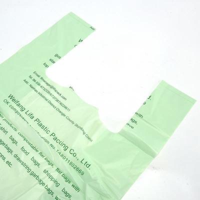 China 100% Biodegradable Compostable Star Seal T-Shirt Bags on Roll 25x40cm 8kg Load Waste Collection for sale