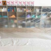 China Custom Logo Transparent Table Cover Sheet LDPE 4mx2.5m for Cookware Packaging for sale