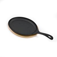 China Custom Cast Iron Steak Pan 10 Inch with Wooden Base for Induction Stove Tops for sale