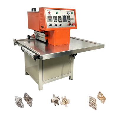 China Vacuum Automatic Centrifugal Casting Machine Spin Casting Equipment for Seashell Alloy Buttons for sale
