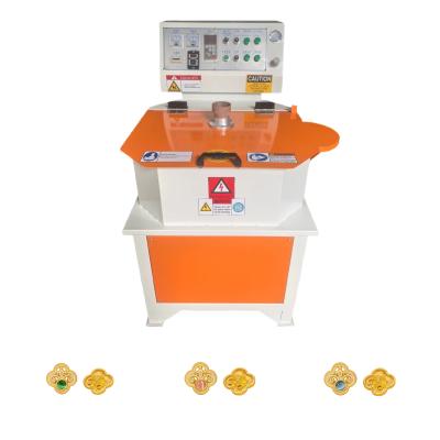 China Manual Centrifugal Casting Machine Auspicious Pattern Cufflinks Lady Zinc Alloy Metal for sale