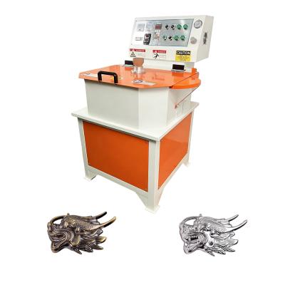 China Dragon Head Men Zinc Alloy Belt Buckle Centrifugal Cast Ornament Spin Casting Machine for sale