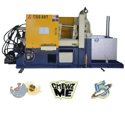 China Zinc Alloy Die Casting Machie Enamel Pin Die Casting Machine Metal Badge Diecast Machine for sale