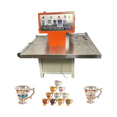 China Fully Automatic Zinc Alloy Centrifugal Casting Machine for Metal White Alloy Patterned Gemstone Decorated Cup Production for sale