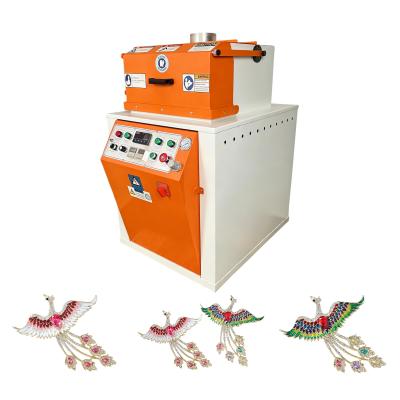 China Semi-Automatic Centrifugal Casting Equipment for Phoenix Fashion Clothing Zinc Alloy Chest Pin Production for sale