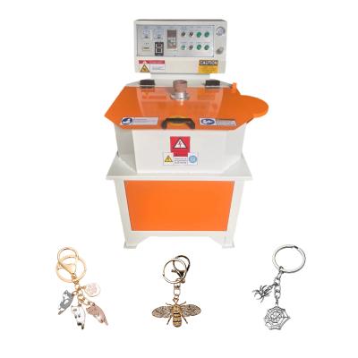China Metal Zinc Alloy Keychain Handicraft Small Pendant Manual Vacuum Centrifuge Production Equipment for sale