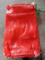 China Red PP Leno Woven Mesh Bag with Drawstring 1.4mm x 1.6mm Mesh 5kg-25kg Capacity for sale