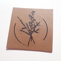 China Embossed Brown Jean Leather Patch Black Logo Label For Clothes for sale