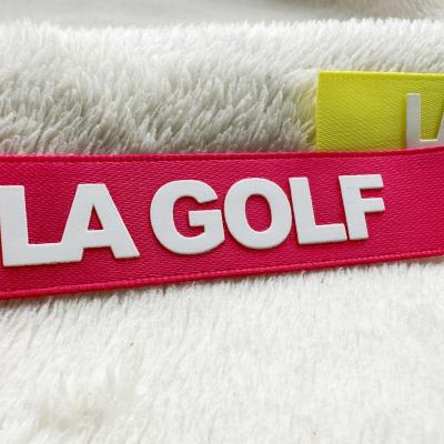 China Satin Tape Clothing Fabric Labels Printing Silicone Logo Embossed for sale