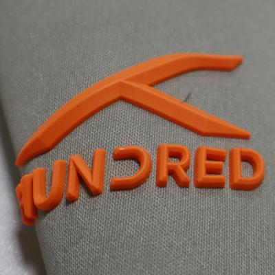 China Customizable Soft LED Flashing 3D Silicone Badge and Garment Label for Clothing for sale