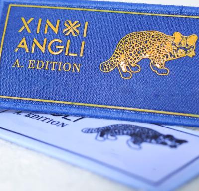 China Square Shape One Side Fold Heat Transfer Printing Custom Silicone Label for Garments for sale
