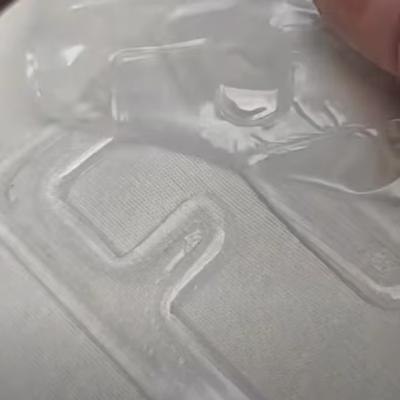 China Custom Logo Transparent Modern Silicone Heat Transfer Label with Heat Cut for Garment and Clothing for sale