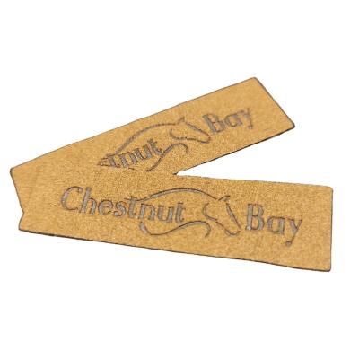China Custom Garment Accessories Suede Microfiber PU Leather Label With Debossed Logo for Shoes Clothes Bags for sale