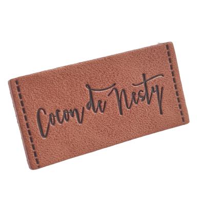 China Customized Shape Leather Printing-Letter Label PU Leather Patches for Jeans Jacket Hats for sale