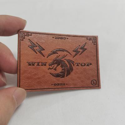 China New Design Custom Embossed Logo Faux Leather Labels Stitching Custom Embossed Leather Patches for Garments Leather Badges for sale
