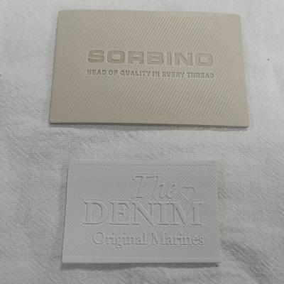 China OEM High Quality  PU Leather Patches Custom Laser Embossing  Leather Sew on Jeans Jacket Printing Badge for sale