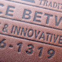 China Factory Custom Leather Badges Debossed Design Sew on Leather Convex Concave Leather Patches Iron on Clothing Labels for sale