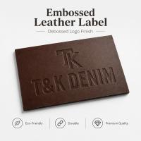 China Custom Embossed Leather Patches Heat Transfer Iron On Genuine Leather Labels Designed For On Clothes Bags Shoes And Hats for sale