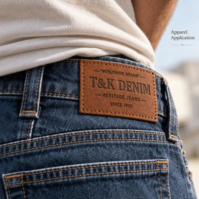 China Custom PU Leather Patches with 3D Embossed Logo for Denim Clothing Brands in Customized Sizes for sale