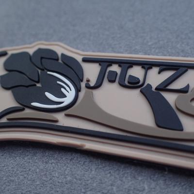 China High Strength Ultrasonic Cut OEM Rubber Logo Patches for sale