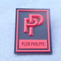 China Hard PVC Sew On Embossed Rubber Clothing Labels for sale