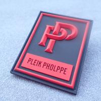 China Hard PVC Sew On Embossed Rubber Clothing Labels for sale