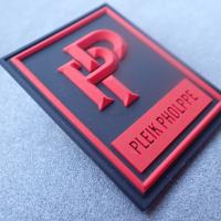 China Hard PVC Sew On Embossed Rubber Clothing Labels for sale
