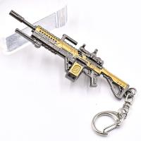 China 11cm Metal Keychain Gun Props In The Game APEX Hero Focus Light Machine Gun Model Toy for sale