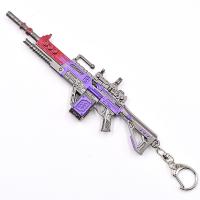 China Purple mini metal gun mold Key ring 1:6 authentic restoration of game props gun Ape x shoot game gun keychain for sale
