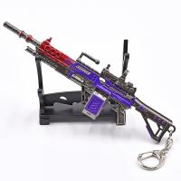 China Purple mini metal gun mold Key ring 1:6 authentic restoration of game props gun Ape x shoot game gun keychain for sale