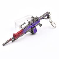 China Purple mini metal gun mold Key ring 1:6 authentic restoration of game props gun Ape x shoot game gun keychain for sale