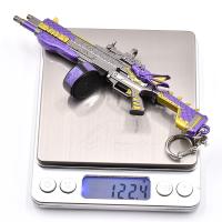 China Purple Mechanical Wind mini metal gun molde Keychain 1:6 authentic restoration of game props Ape x shoot game for sale