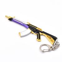 China Unisex Metal Gun Keychain Prime Vandal Crafts Gold Color Art Key Chain for sale
